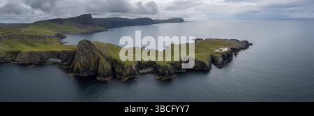 A drone view of the Neist Point Lighthouse and the Minch on the western ...