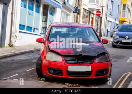 Red VW car fire burnt Stock Photo - Alamy