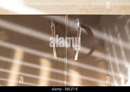 fragment of kitchen furniture. Kitchen cabinet door and handle Stock ...