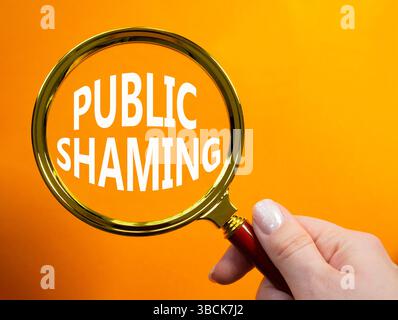 Public Shaming symbol. Magnifying glass with words Public Shaming ...