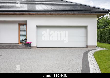 Modern garage elevation. Designer driveway garage with house. Modern ...