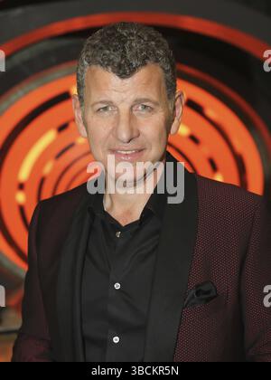 Folk music singer Semino Rossi reacts after receiving an award during ...
