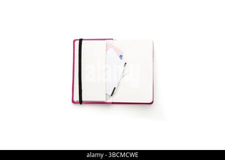 blank open diary with side pocket and slips of paper, isolated on white ...