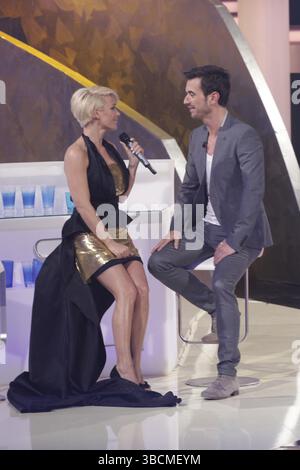 Singer Michelle (R) and TV presenter Florian Silbereisen act on stage ...