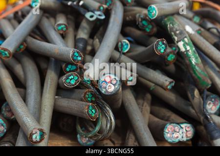 A bunch of old copper cables in a plastic sheath. Front view Stock ...