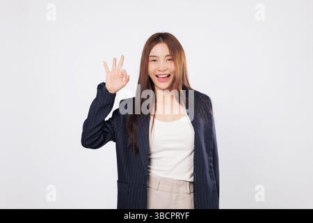 OK symbol ok feeling from an expressive woman presenting fingers in an ...