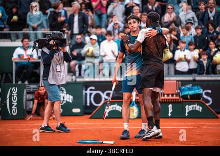 Alexander SHEVCHENKO of Kazakhstan helps Mathys ERHARD of France to ...
