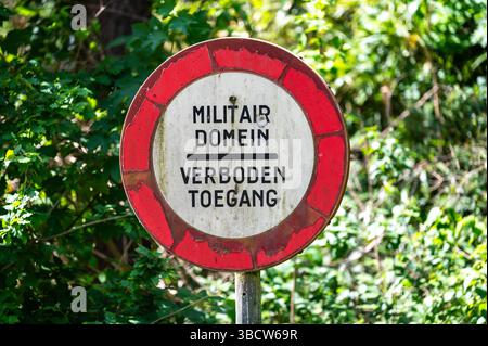 Signs of a no drone and no caemra zone on a military domain in ...