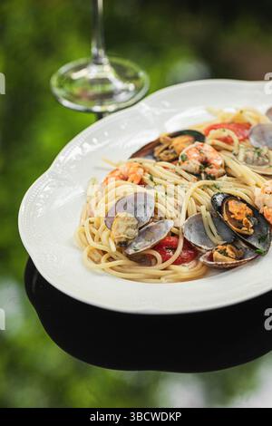 Italian seafood spaghetti pasta pescatore with mussels clams shrimp and ...