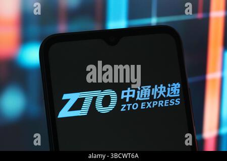 In this photo illustration, the ZTO Express logo is displayed on a ...