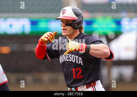 Minnesota Twins' Harrison Bader celebrates in the dugout after hitting ...