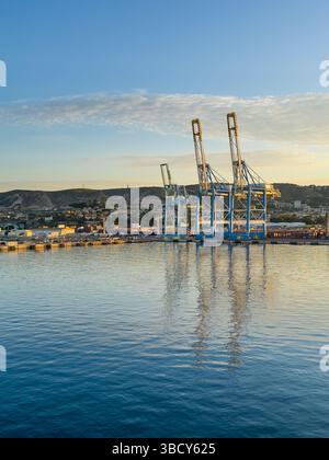 Marseille, France - July 10, 2024: Sunrise over container terminal and ...