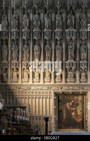 Reredos of stone statues representing christian saints and heroes ...