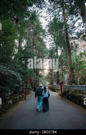 The red torii gate leading to Lake Ashi of Hakone Shrine in Motohakone ...