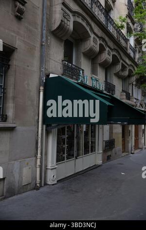 An elegant European street lined with historic buildings featuring ...