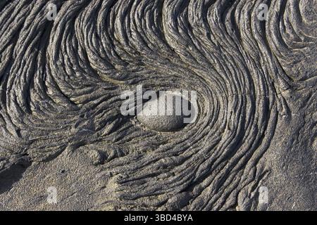 Area of solidified black lava - pahoehoe lava Stock Photo - Alamy