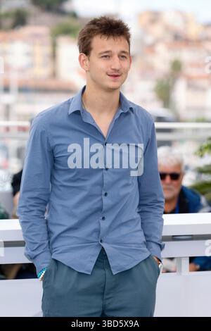 Timi-Joy Marbot poses at the photocall of 'L'Homme Qui A Vu L'Ours Qui ...