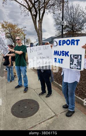 Duluth, GA / USA - March 29, 2025: Protesters display anti-Elon Musk ...