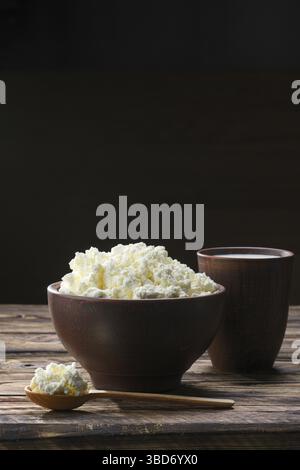 Grain cottage cheese with sour in the bowl Stock Photo - Alamy