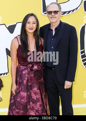 Karen Ho and Steve Buscemi arrive on the red carpet for the Netflix ...