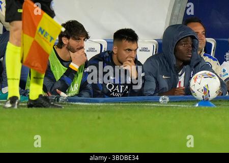 Inter Milan's Lautaro Martinez, centre bottom, challenges for the ball ...