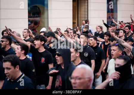 Several people perform the fascist salute during a tribute organized by ...