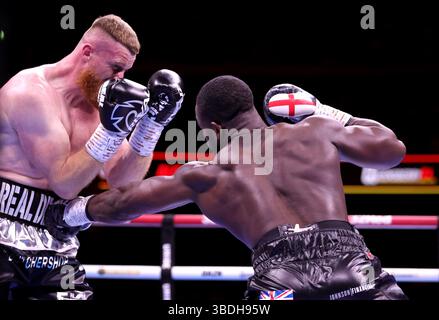 Aloys Youmbi (right) in action against David Jamieson in the vacant ...