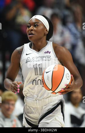 Las Vegas Aces guard Dana Evans (11) passes around Minnesota Lynx ...