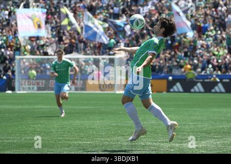 Seattle Sounders FC forward Paul Rothrock (14)lines up a cross with ...