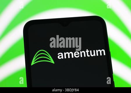 In this photo illustration, the Amentum logo is seen displayed on a ...