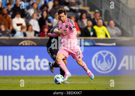 Inter Miami forward Lionel Messi, center, arrives at Gillette Stadium ...