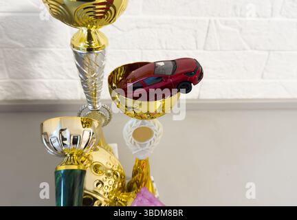 Prizes at competitions in racing cars Stock Photo - Alamy