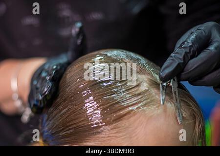 master creates a slick and cold wave hairstyle with hair gel and fixer ...