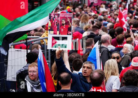 An Aberdeen fan holds a sign in support of Oday Dabbagh during the ...
