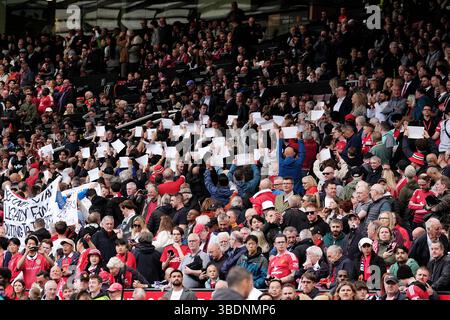 Manchester United fans protest with cards directed at the directors box ...