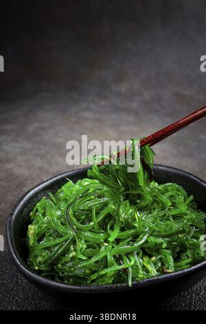 Chuka salad made from fresh seaweed, with sesame dressing, two bowls ...