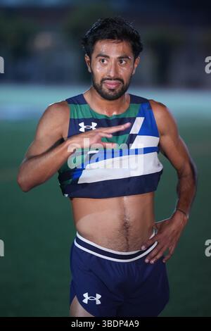 Eduardo Herrera (MEX) poses after winning the USATF 5,000m in 12:58.27 during Sound Running ...