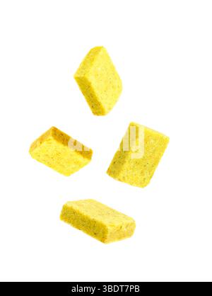 Bouillon cubes flying in air on white background Stock Photo - Alamy