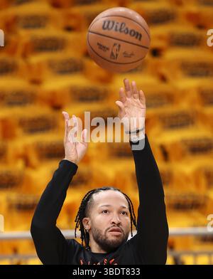 New York Knicks guard Jalen Brunson, center, watches during the New ...