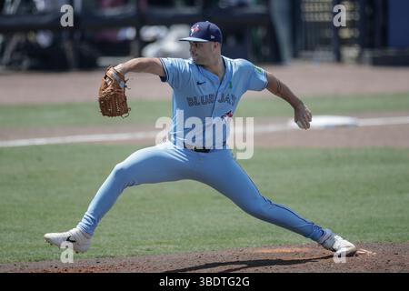 Toronto Blue Jays pitcher Mason Fluharty throws during the seventh ...