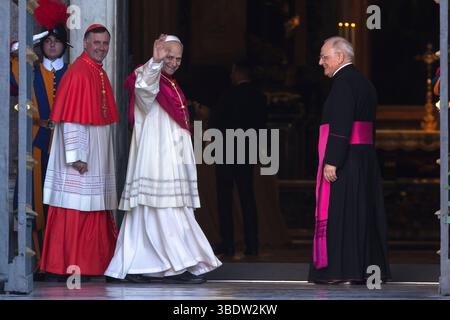 Pope Leo XIV greets the faithful after leading the Angelus prayer from ...