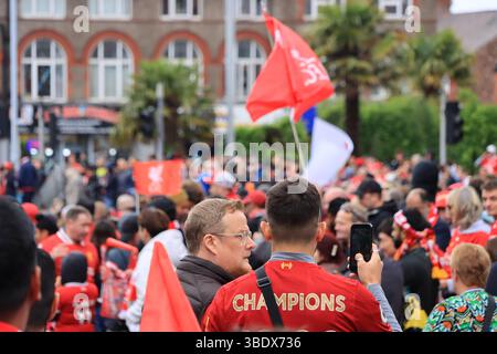A crowd of Liverpool fans waving a flag at Allerton Maze on Queens ...