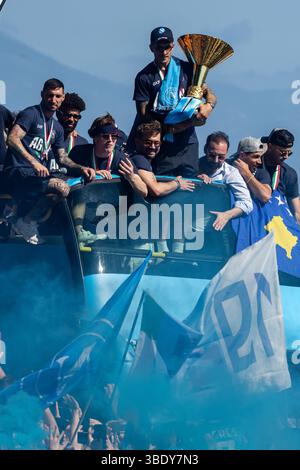 Napoli players and staff parade on a bus to celebrate the scudetto ...