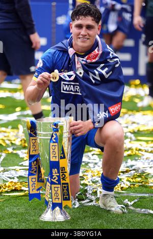 AFC Wimbledon's Matty Stevens celebrates with the trophy during the Sky ...