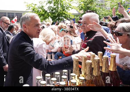 Prime Minister Mark Carney speaks to reporters ahead of a cabinet ...