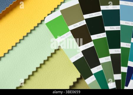 Samples of colorful fabrics and color palettes, top view Stock Photo ...