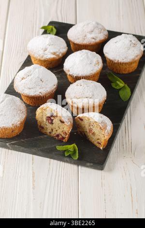 Board with tasty Christmas stollen on table Stock Photo - Alamy