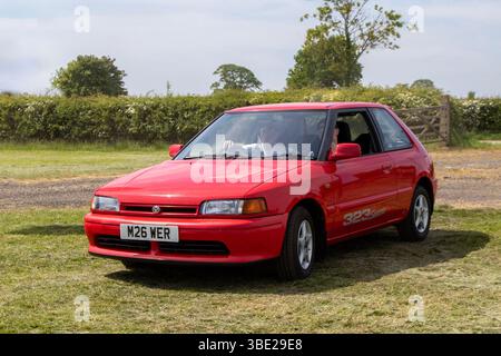 1995 90s nineties red Mazda 323 Sports 5 speed manual 1324cc petrol 2dr ...