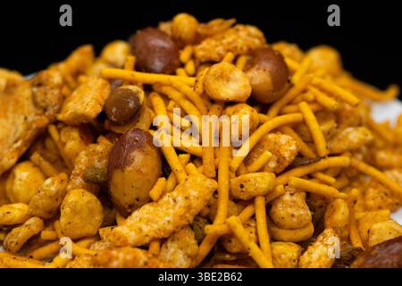 Hot spicy NavRatan mixture snacks in full-frame, made with, potato ...