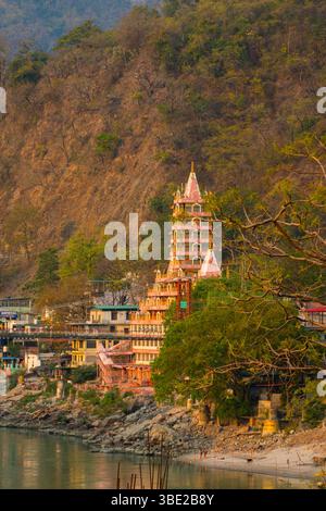 Iconic View of Ganga River, Lakshman Jhula, and Tera Manzil Temple in ...